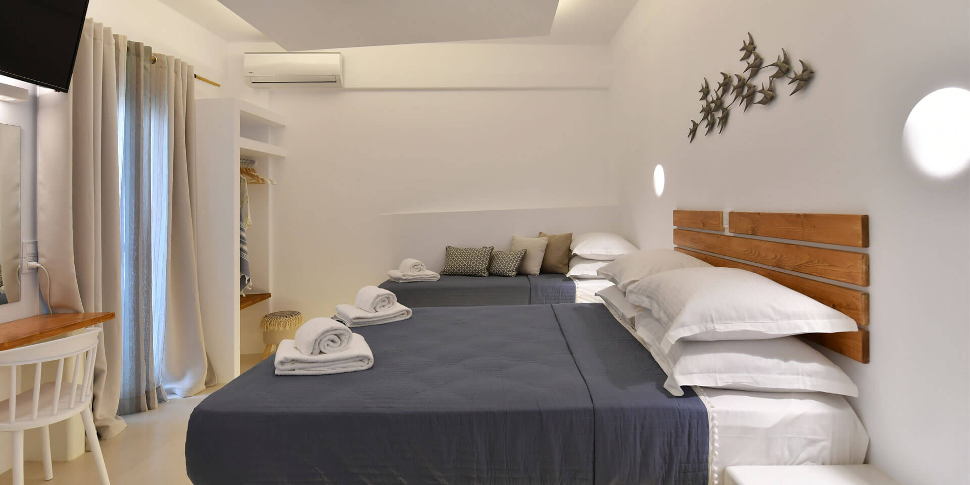 Deluxe Triple Room | Ammos Luxury Rooms & Home